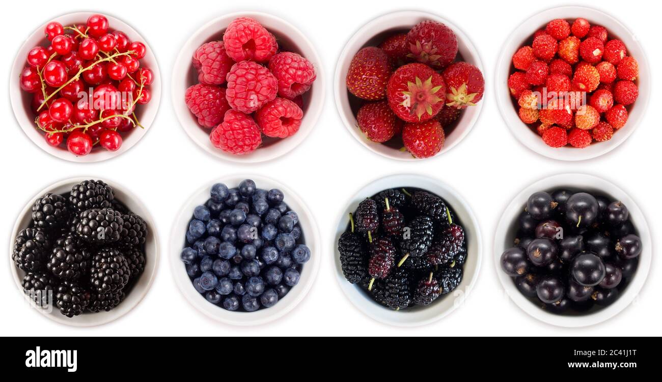 Blue-black and red fruits and berries isolated on white. Sweet and ...