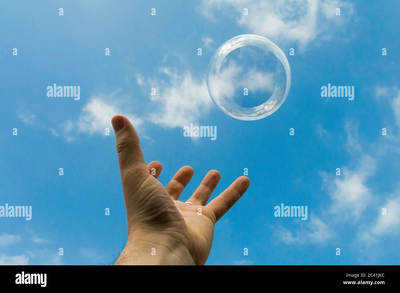 hand and bubble Stock Photo - Alamy