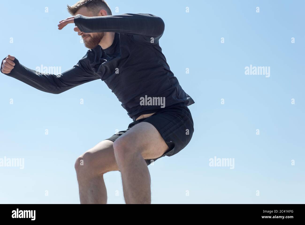 Runner mid air hi-res stock photography and images - Alamy