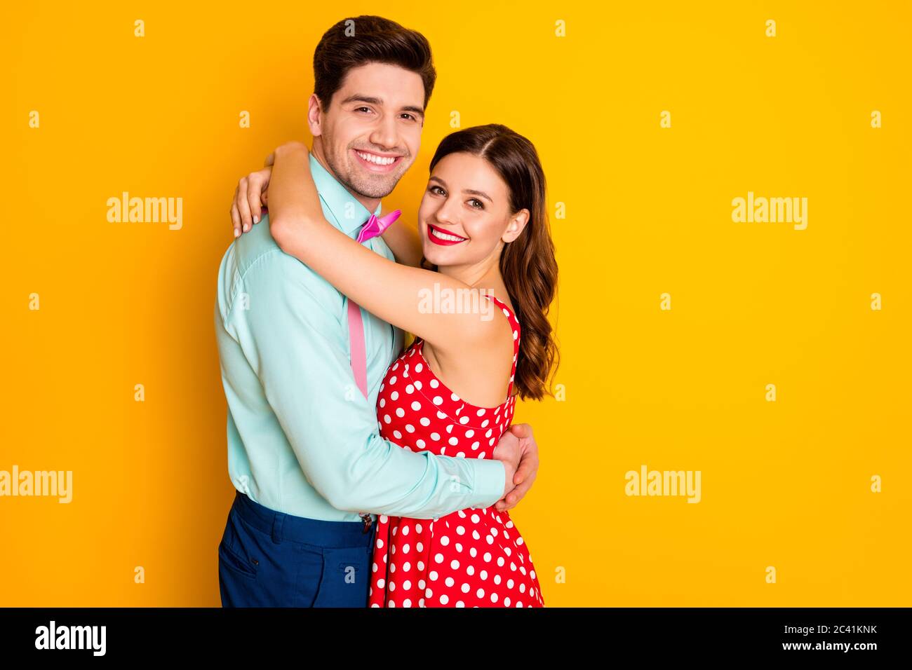 Portrait of positive tender idyllic two couple woman man hug embrace ...