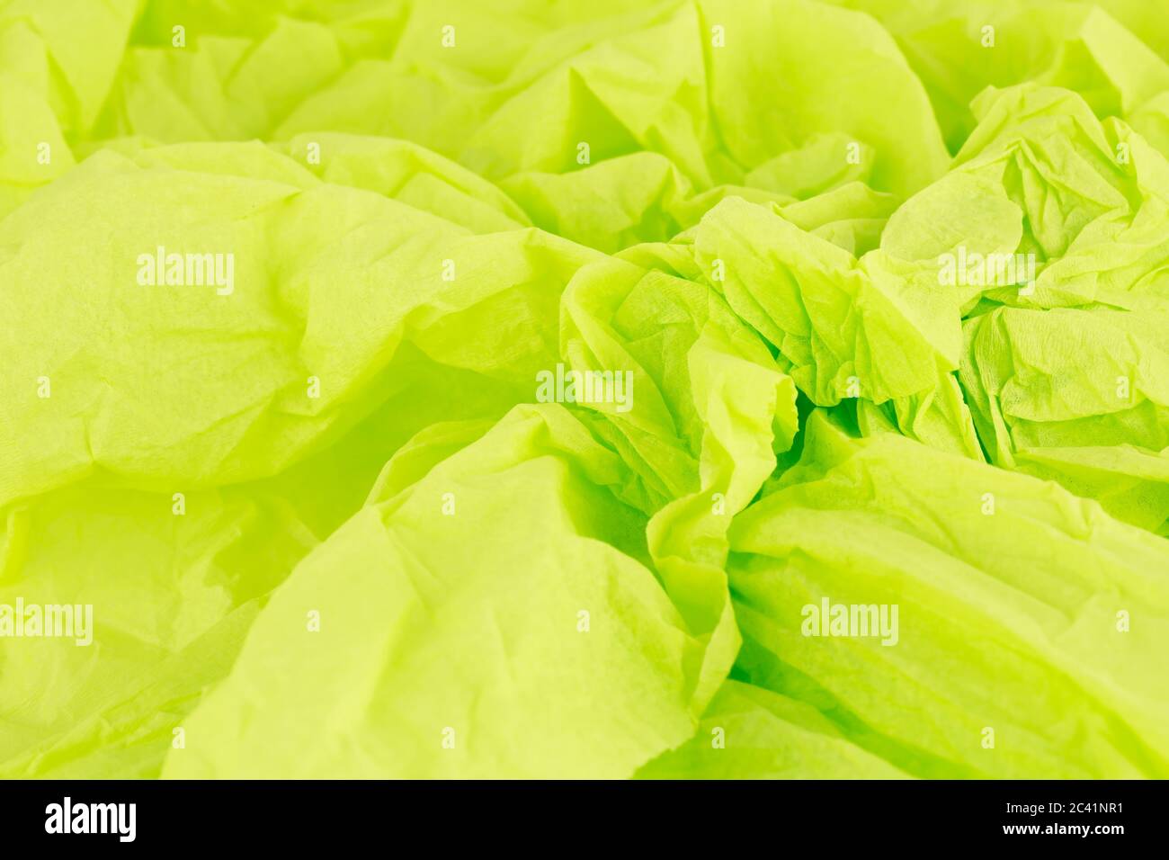 Crumpled green crepe paper texture as a background Stock Photo - Alamy