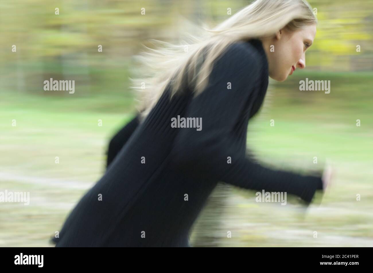 Woman runs away hi-res stock photography and images - Alamy