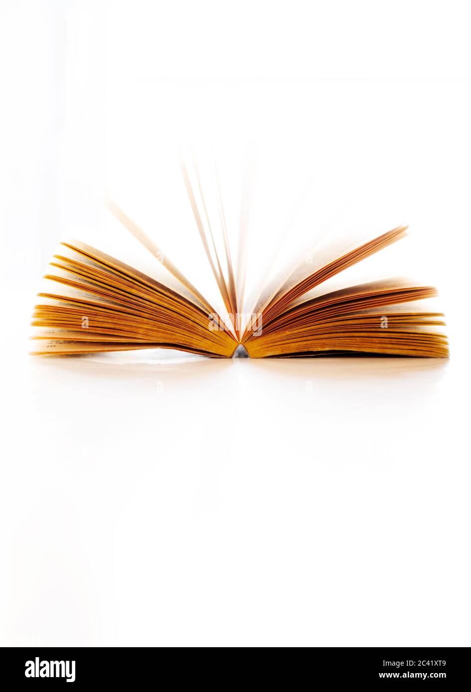 Open book with yellowed old pages Stock Photo - Alamy