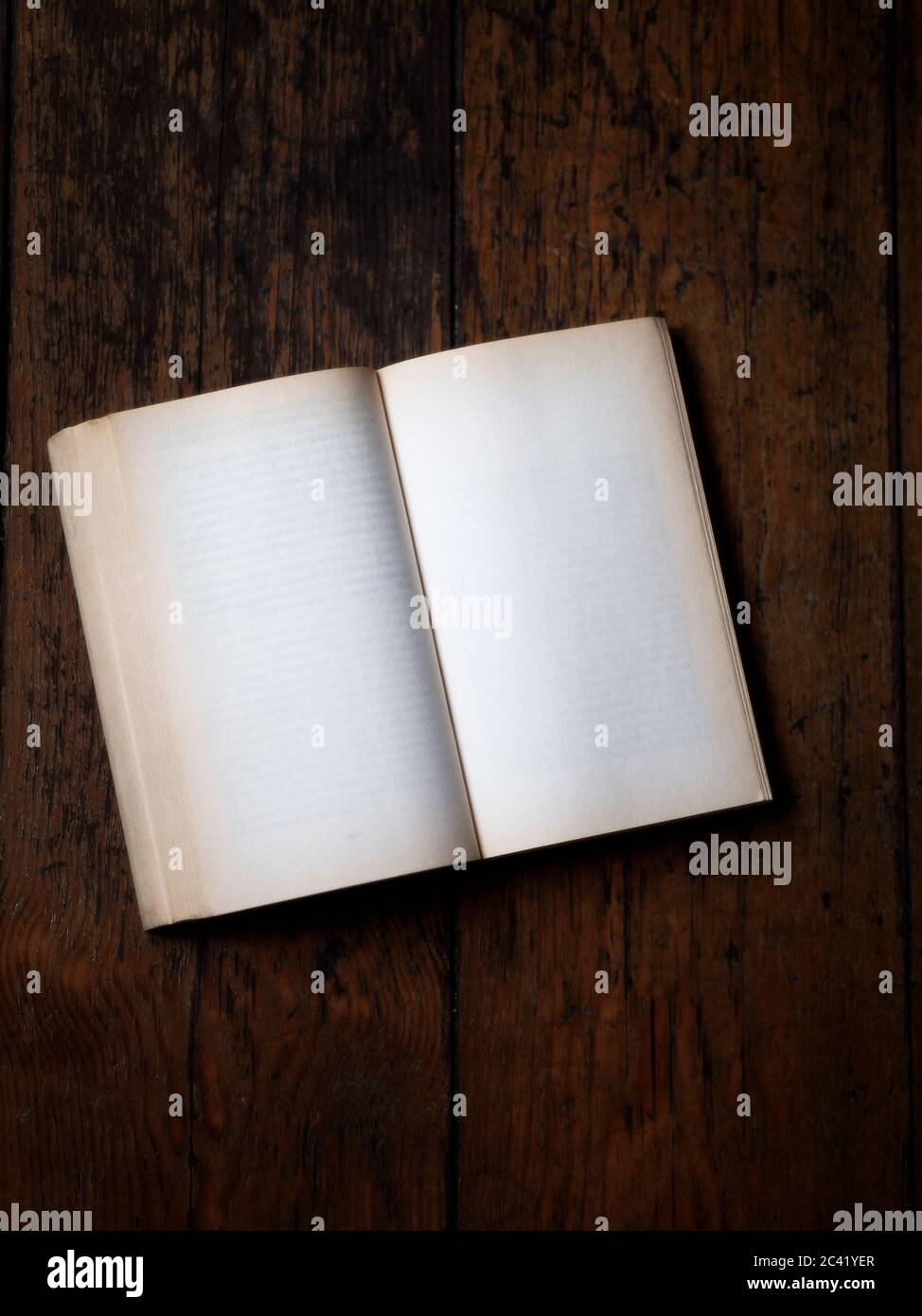 Open book with yellowed old pages Stock Photo - Alamy