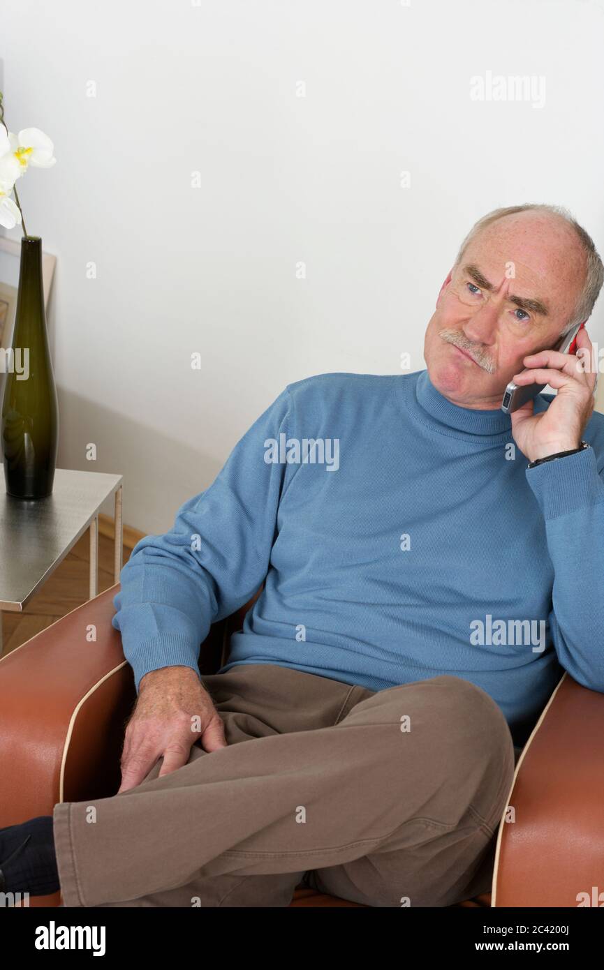 Old man leans in hi-res stock photography and images - Alamy