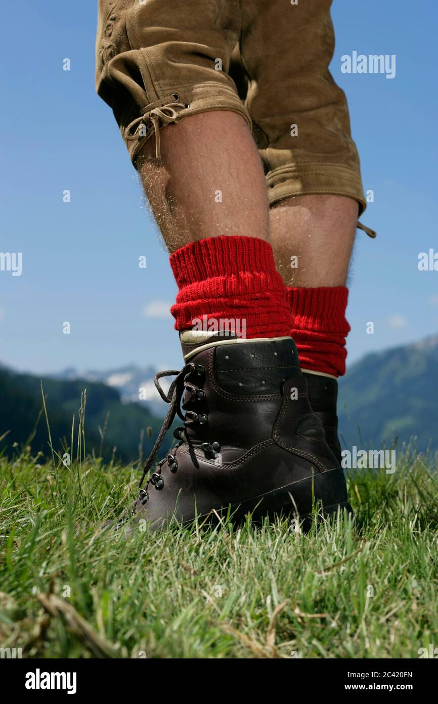 Legs of a hiker in a mountain landscape - Alps Stock Photo - Alamy