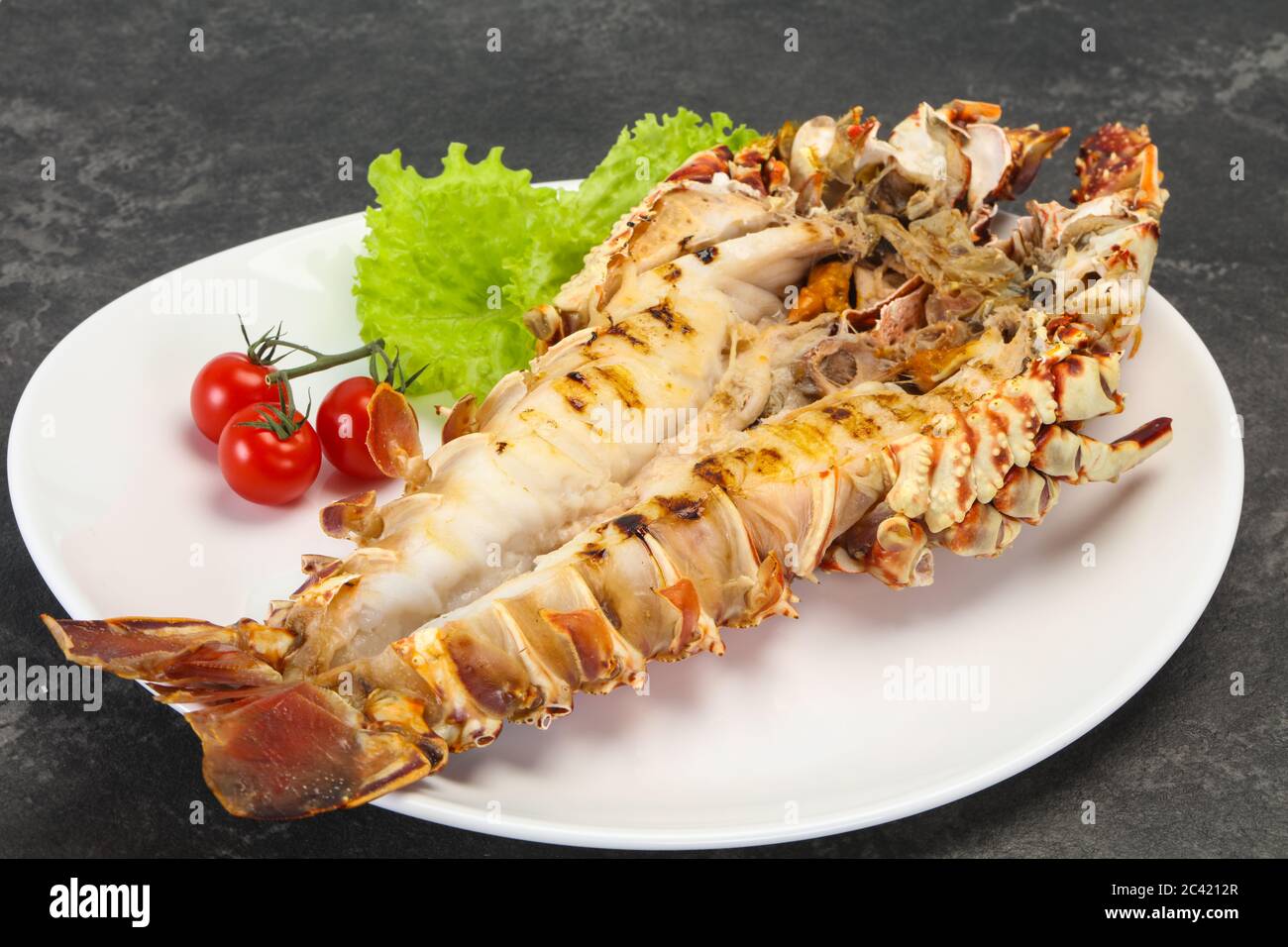 Grilled crayfish in the plate served salad Stock Photo - Alamy