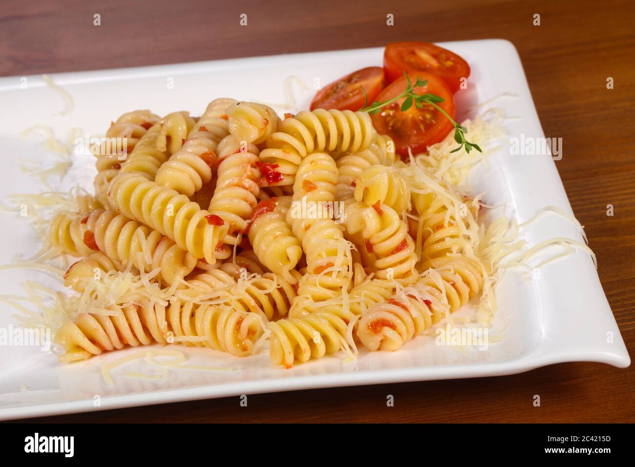 Italian springs pasta with tomato sauce and cheese Stock Photo - Alamy