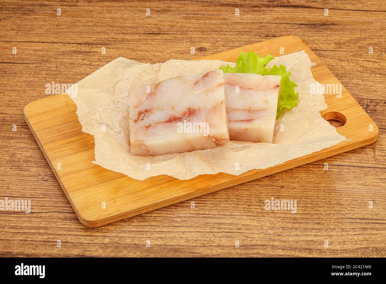 Raw dietary pollock fish fillet for cooking Stock Photo - Alamy
