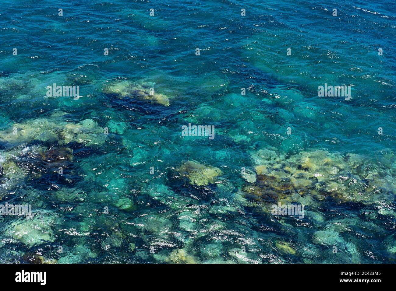 Natural background of pristine ocean water, shallow coast with clear ...