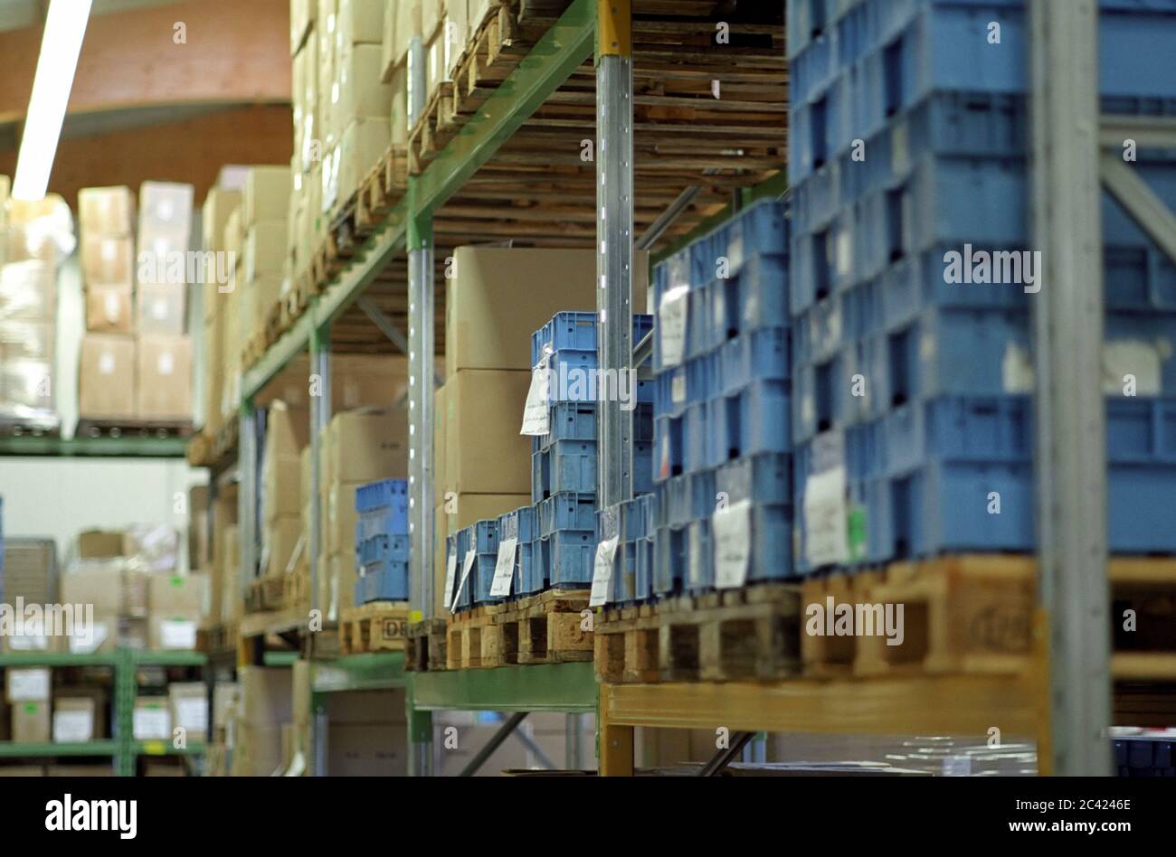 Shelves with packages and boxes in a warehouse - logistics Stock Photo ...
