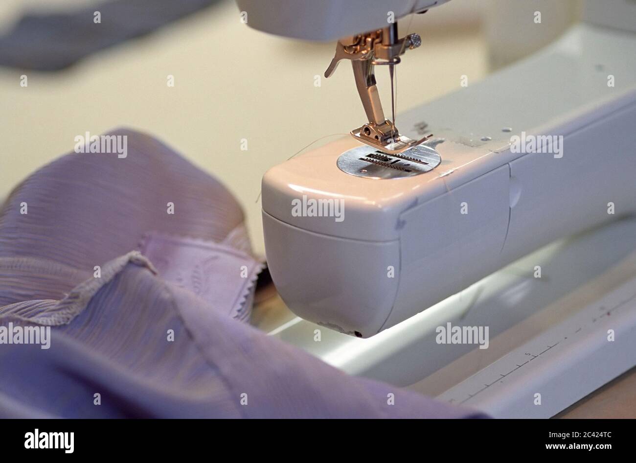 Sewing machine with blue fabric - hobby - tailoring - textiles Stock ...