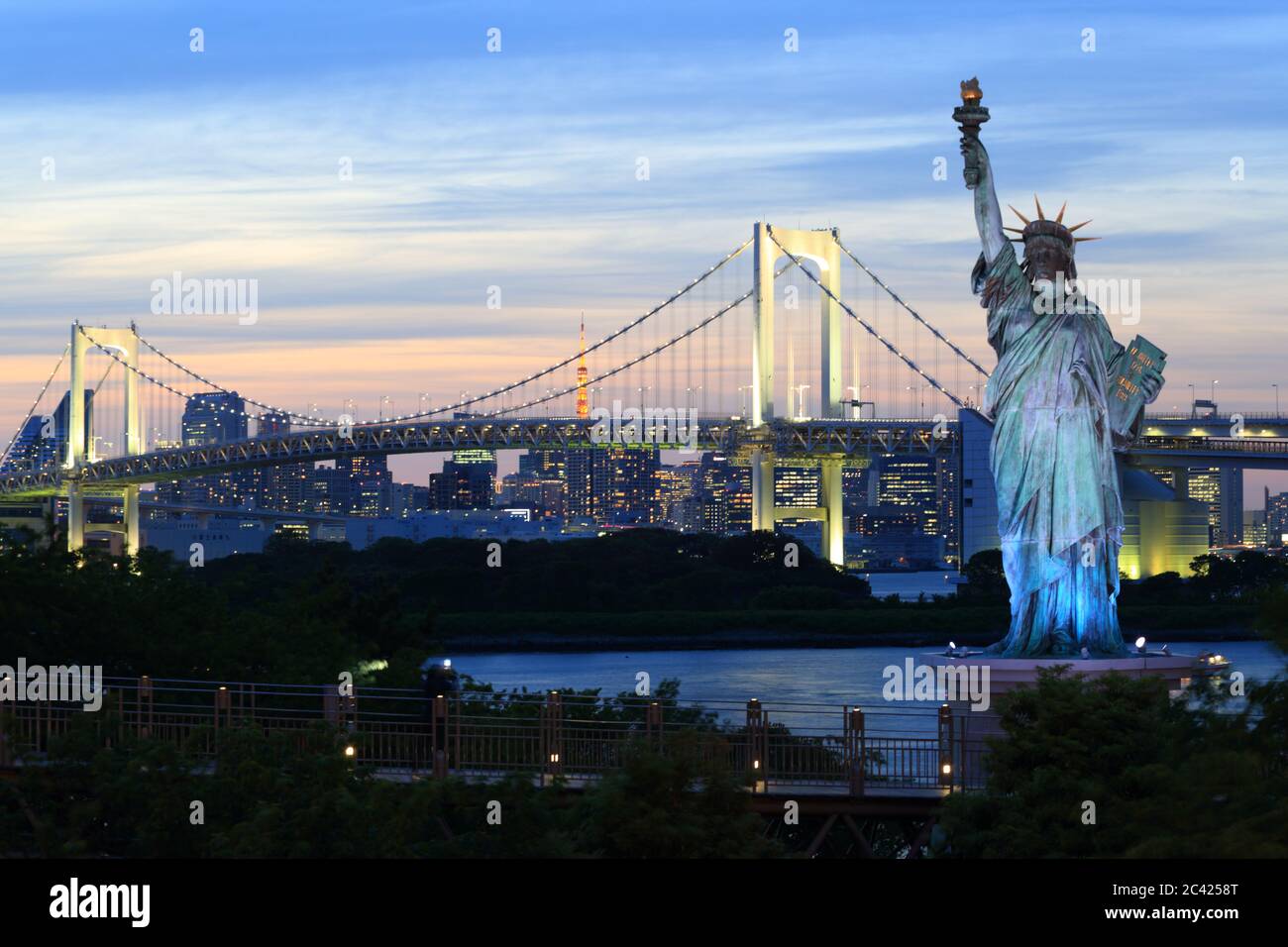 Statue of liberty and Rainbow bridge over Tokyo bay Stock Photo - Alamy