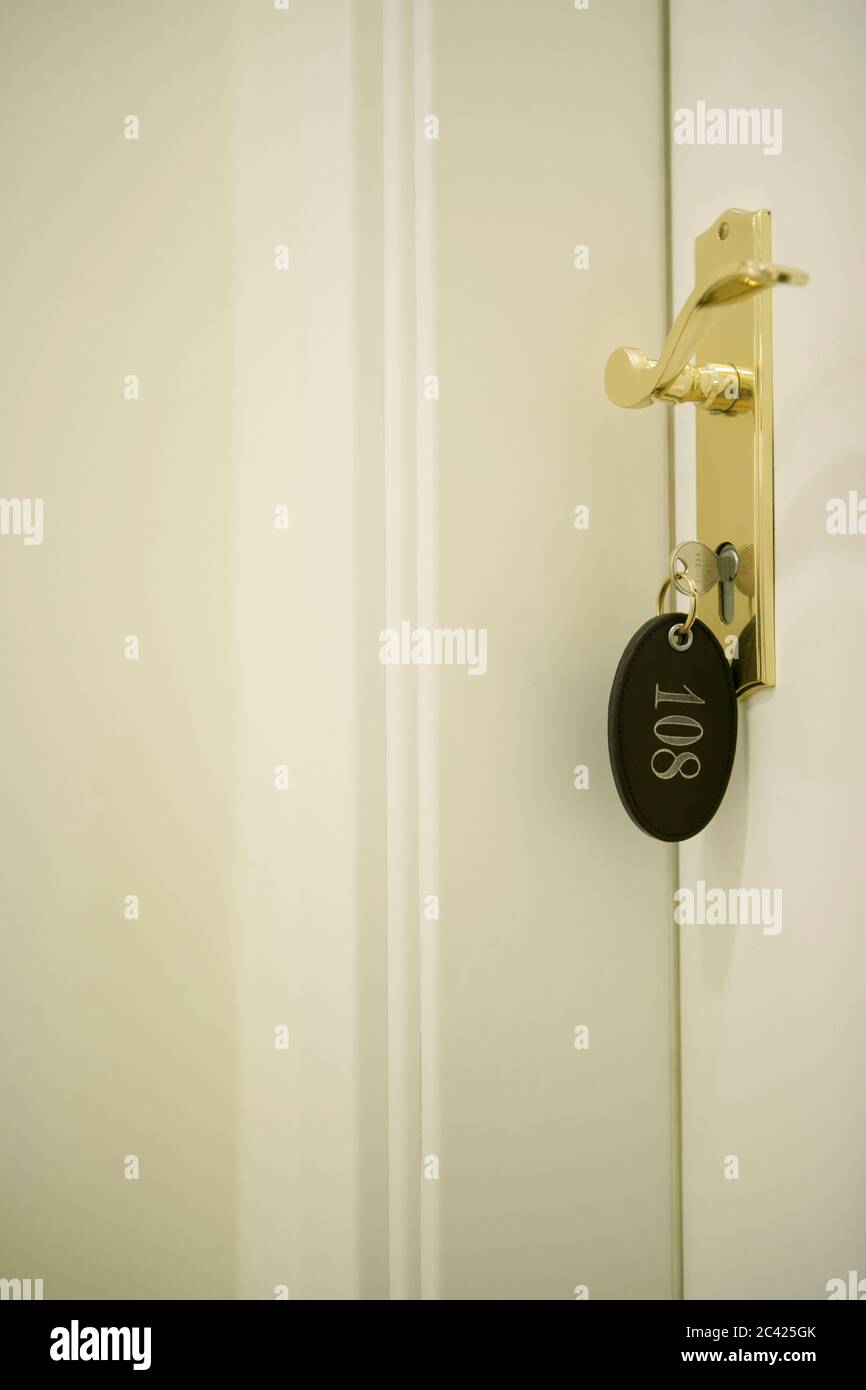 Room key is in a hotel room door Stock Photo - Alamy