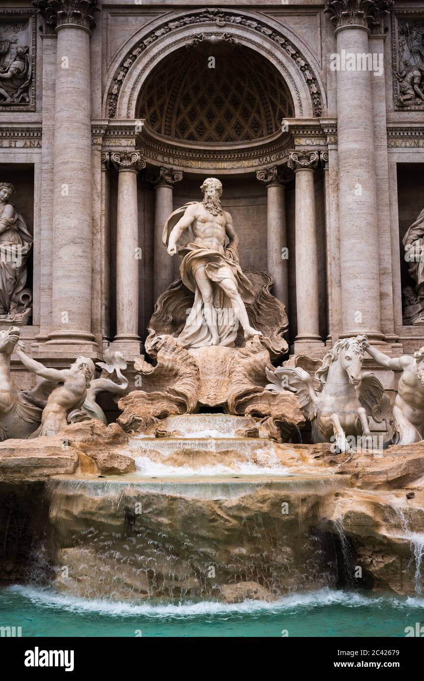 Iconic statue of Neptune in the famous Trevi Fountain in Rome, Italy ...
