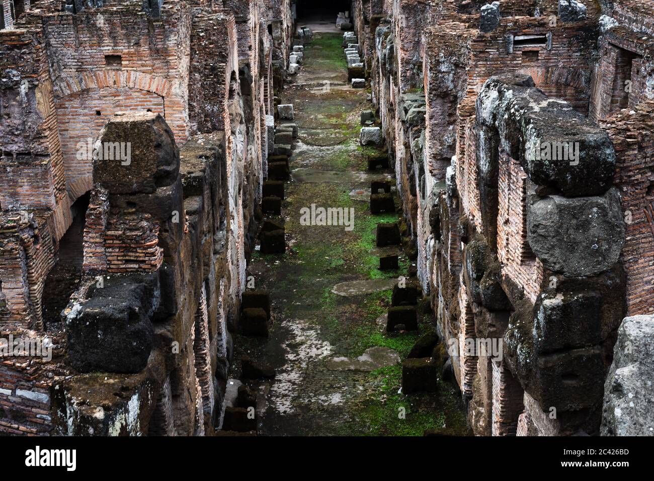 Corridor in the galleries under the central arena of the Colosseum in ...