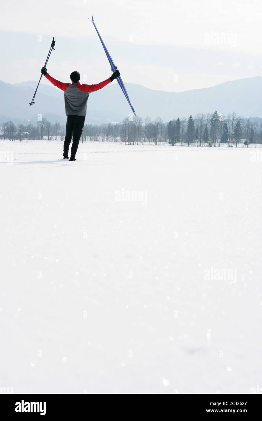 Holds skis hi-res stock photography and images - Alamy