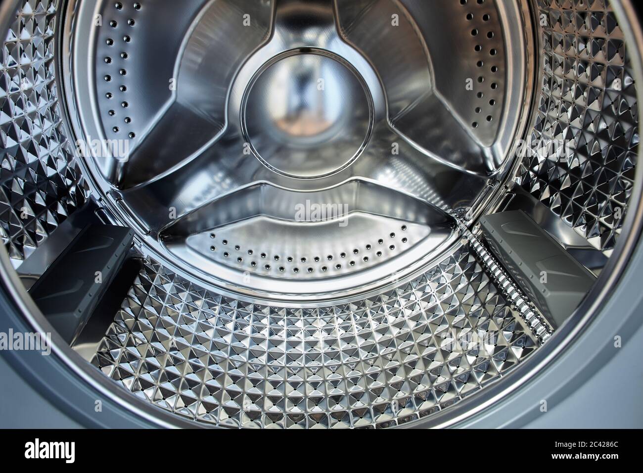 Loading washing machine hi-res stock photography and images - Alamy