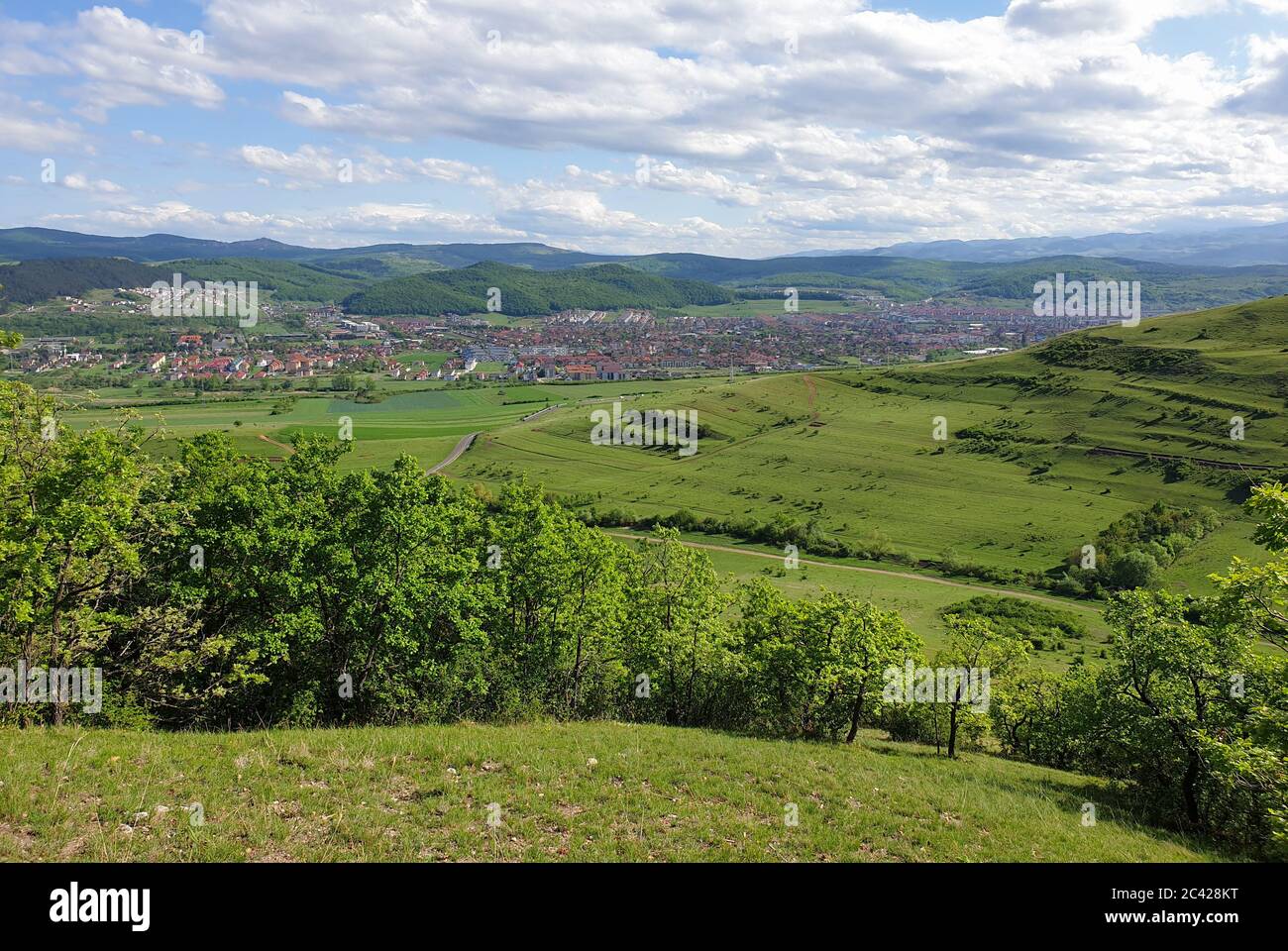 Floresti landscape seen from a green hill with summer sky. Floresti is ...