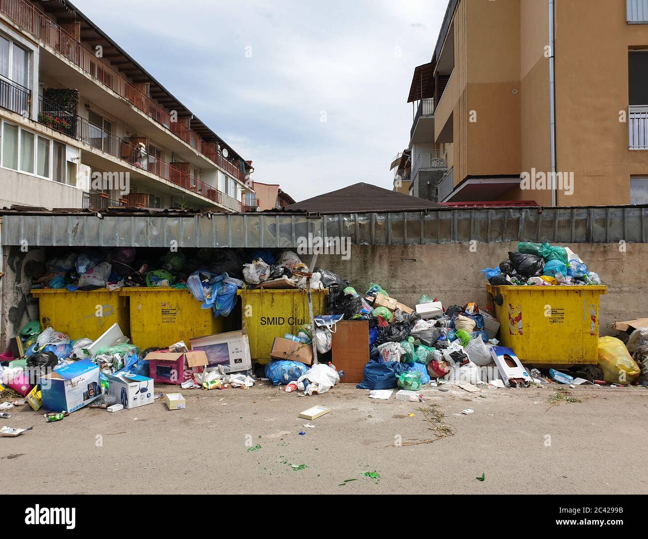 Messy pollution in garbage dump area spills in the streets of Floresti ...