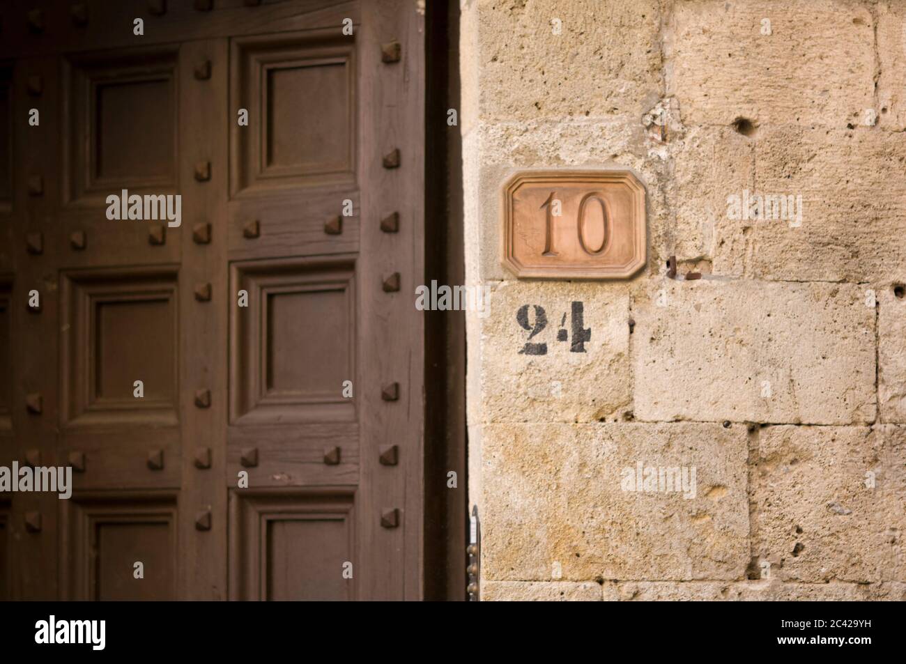 Heavy wooden door Stock Photo - Alamy