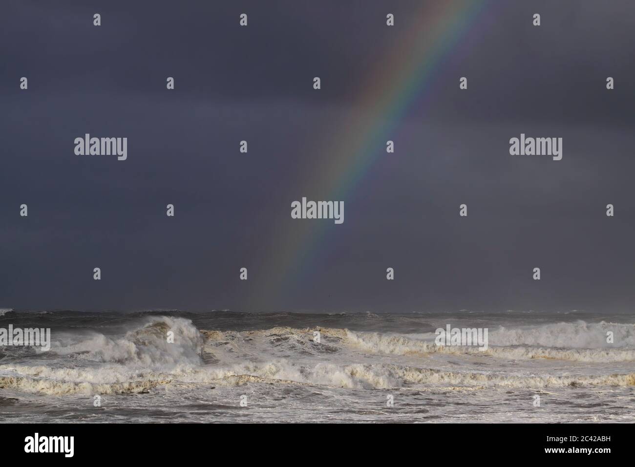 Dark and rainy sea sky with rainbow. Northern portuguese coast Stock ...