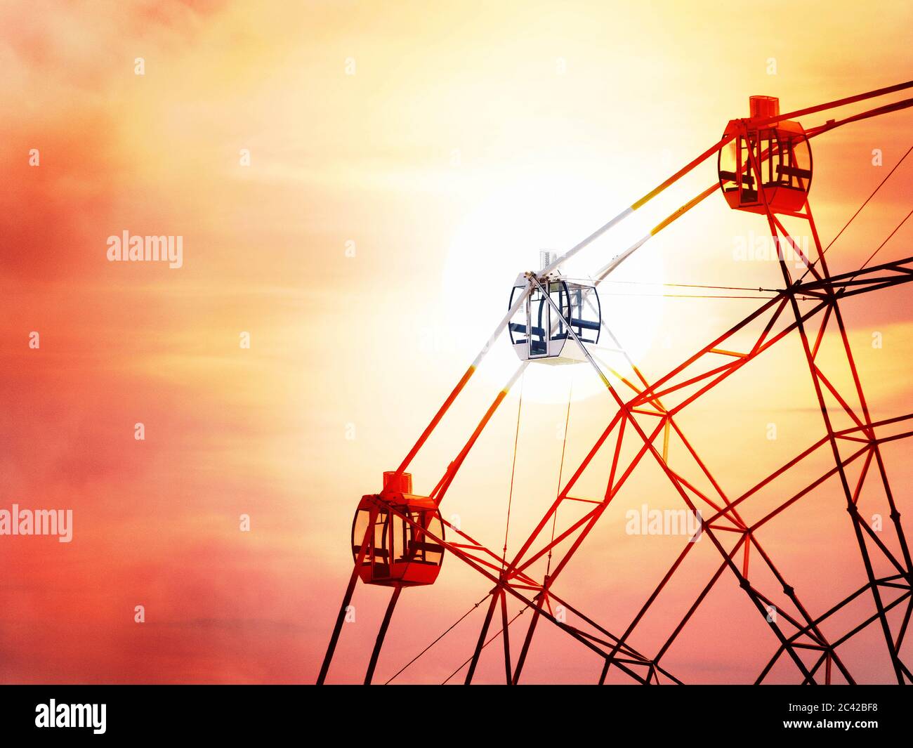 Ferris wheel in amusement Park at sunset. A moment of attraction to ...