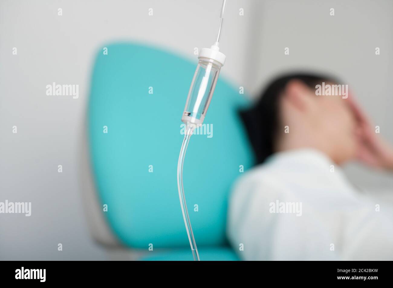 Female patient with IV drip Stock Photo - Alamy