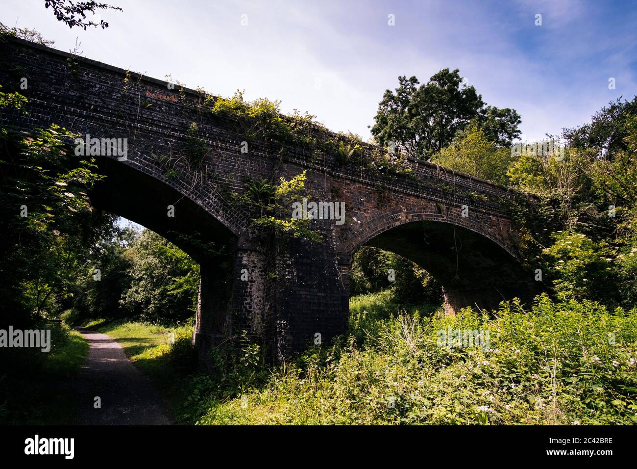 A bridge over the Brampton Valley Way, a disused railway line, now a ...