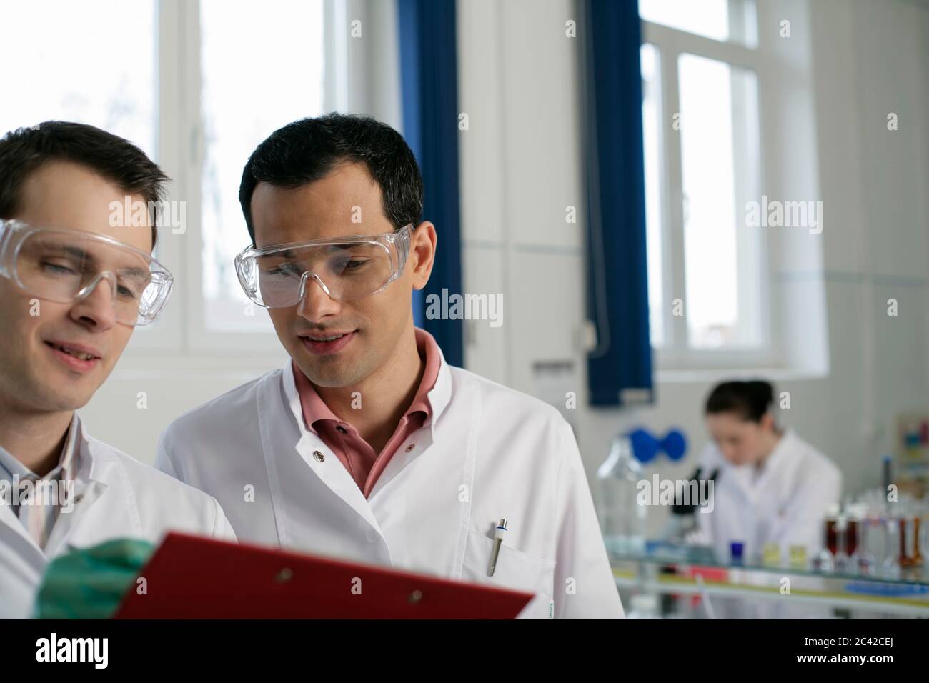 Laboratory workers at work Stock Photo - Alamy