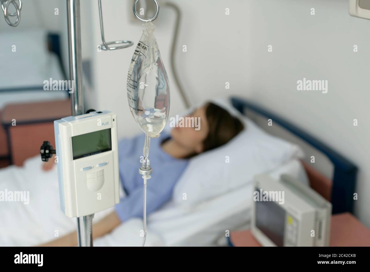 Patient at the drip - hospital room - medicine Stock Photo - Alamy