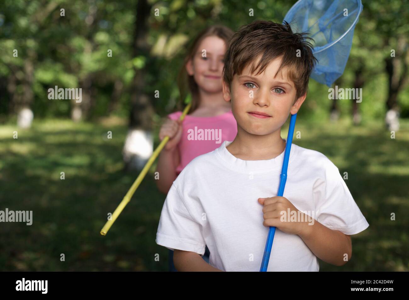 Children butterfly nets hi-res stock photography and images - Alamy