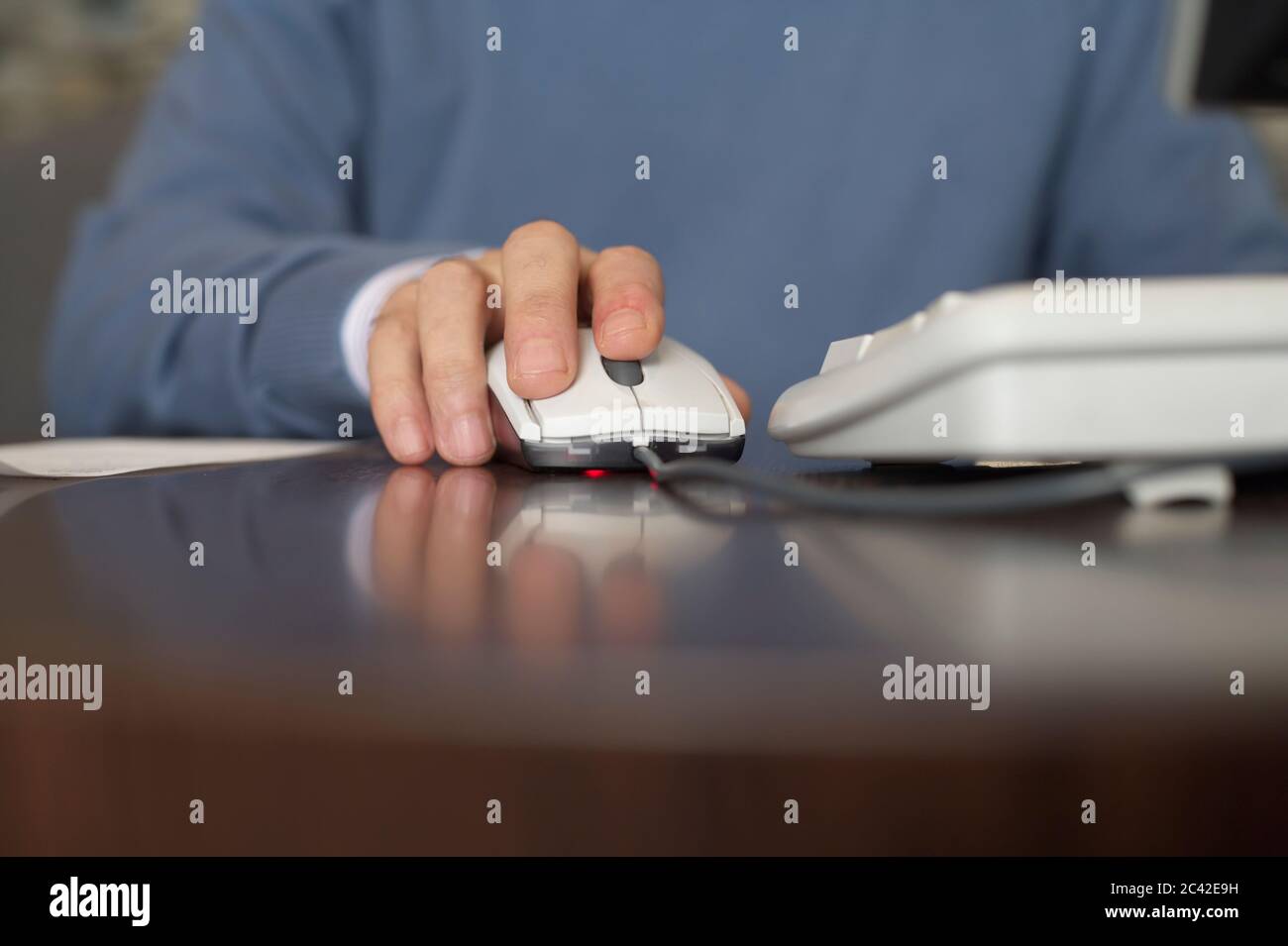 Man operates computer mouse Stock Photo - Alamy