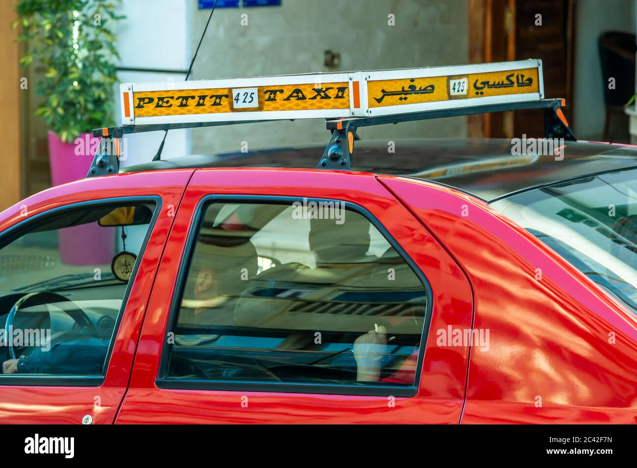 Red petit taxi of Fès, Morocco Stock Photo - Alamy