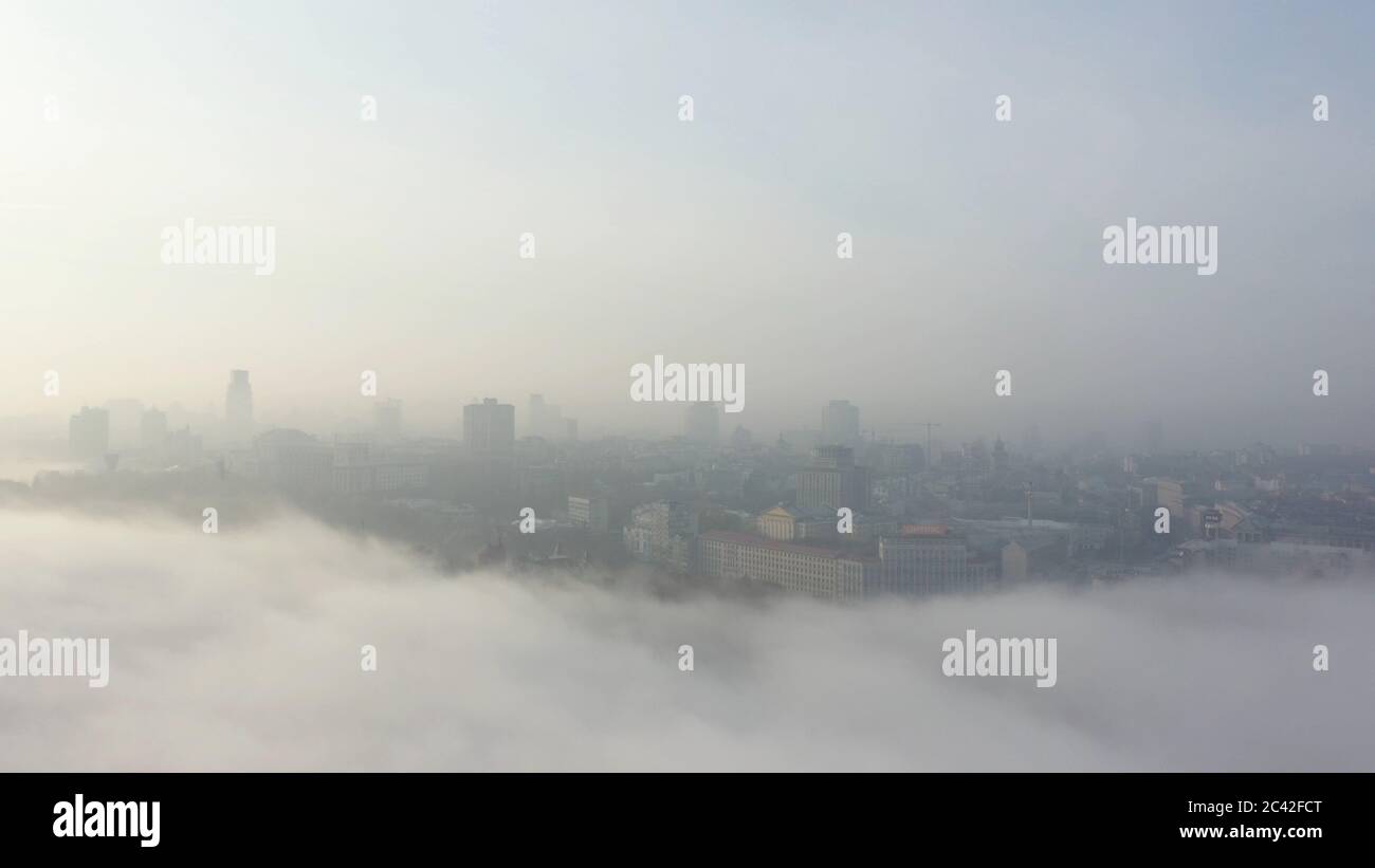 Aerial view of the city in the fog Stock Photo - Alamy