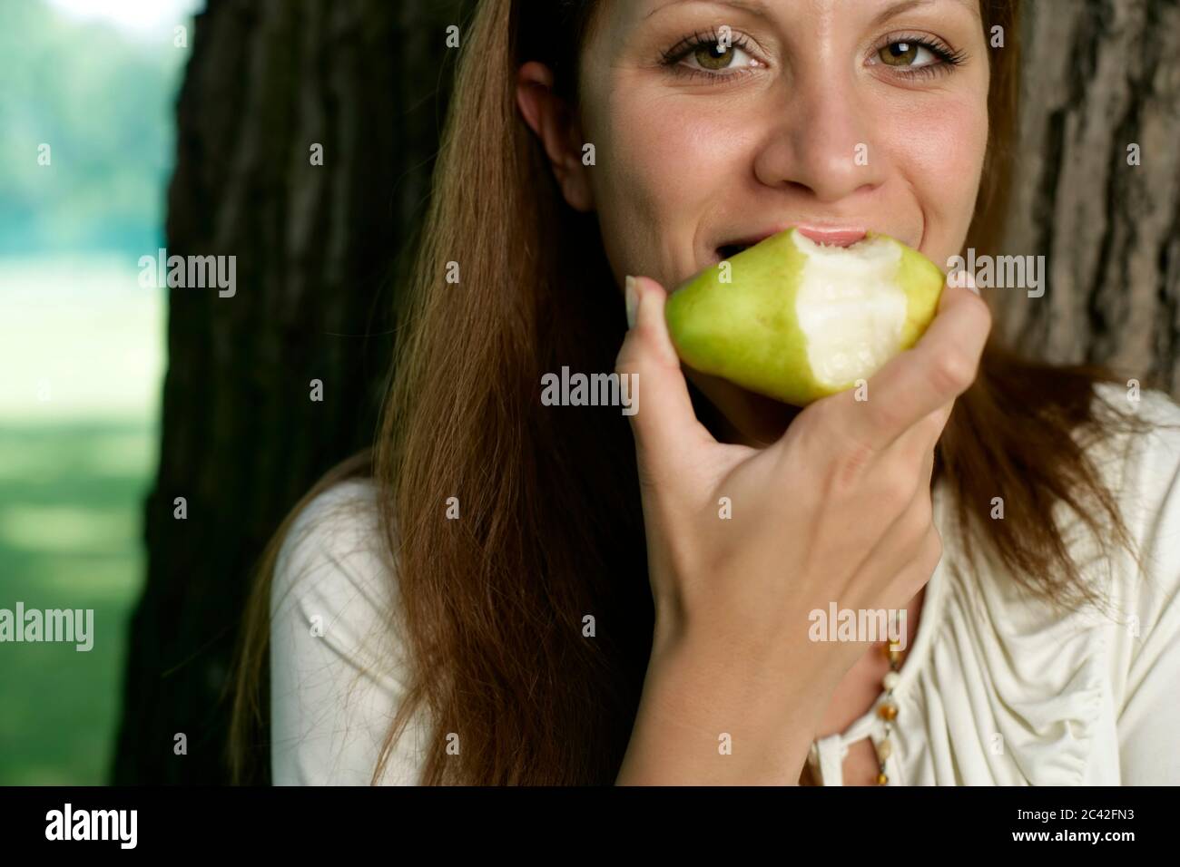 Eats pear hi-res stock photography and images - Alamy