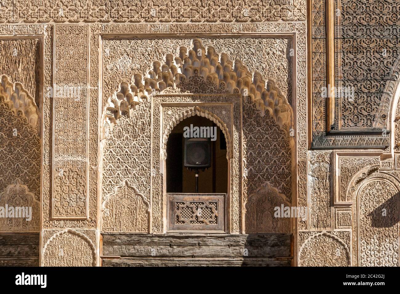 Calligraphy and zellij decoration on wall in Medersa Bou Inania. With ...