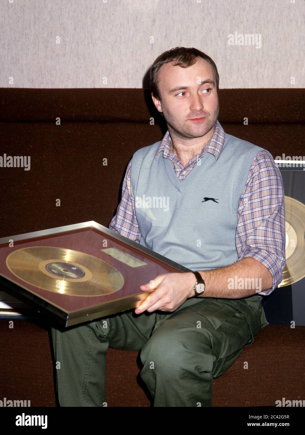 Genesis receiving gold discs backstage at the NEC Birmingham 26th ...