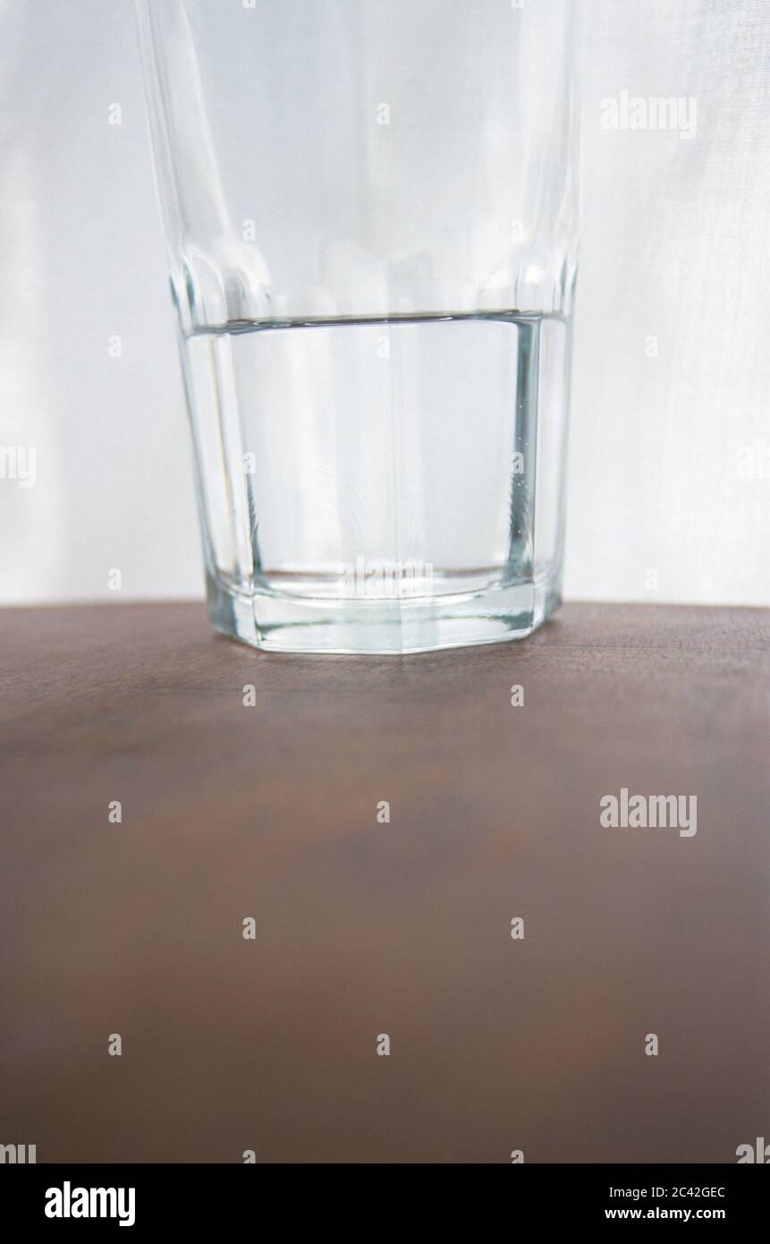 Water glass - drinks - philosophy Stock Photo - Alamy