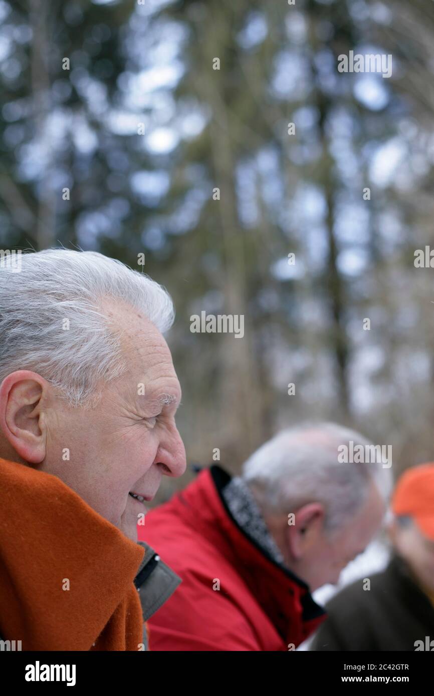 Three old men in the snow Stock Photo - Alamy