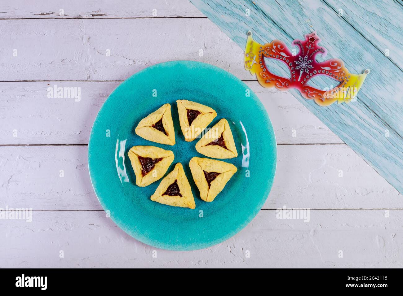 Purim background with mask and hamantaschen triangle cookies Stock ...