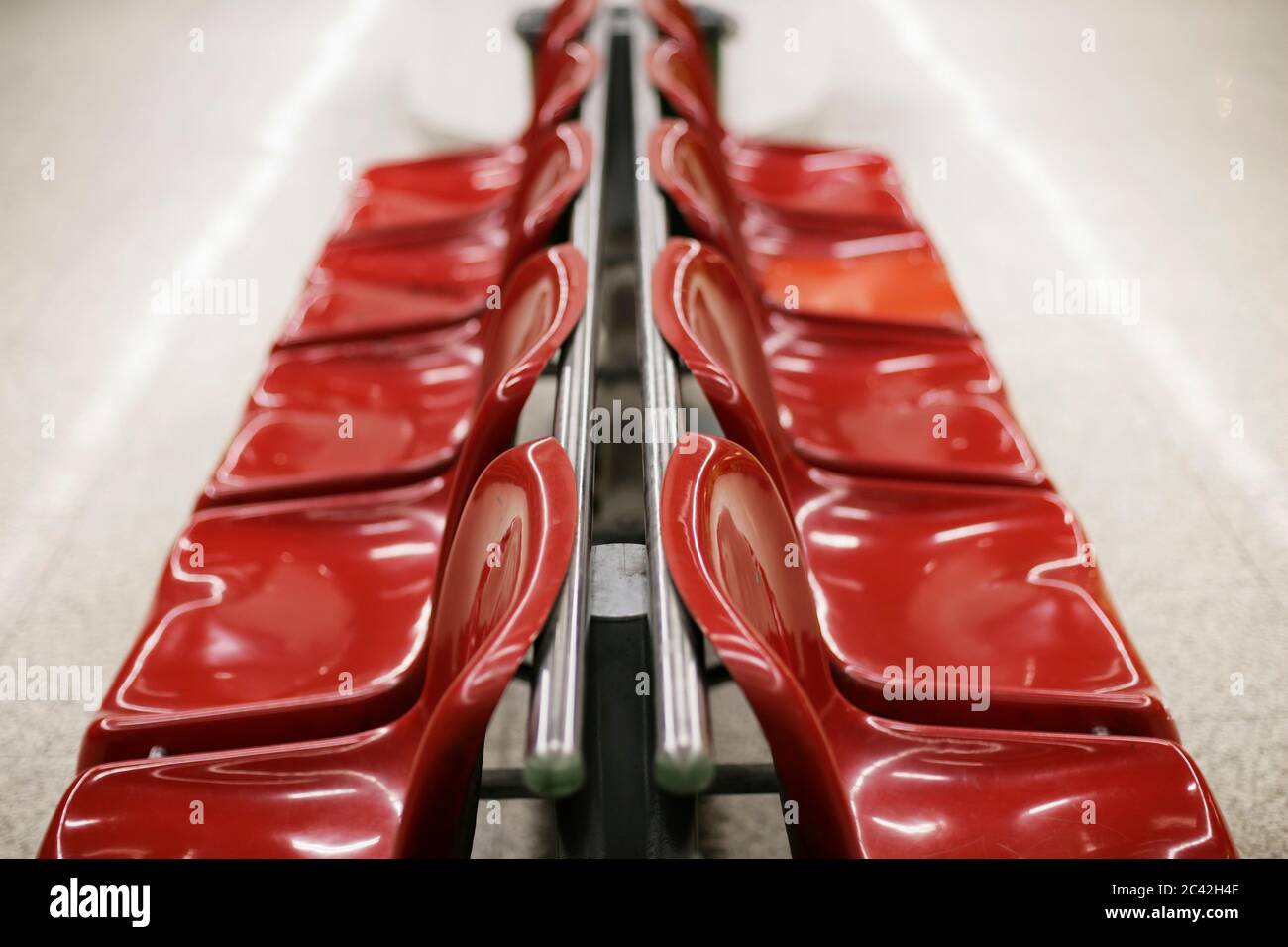 Double-sided row of seats - symmetry - station Stock Photo - Alamy
