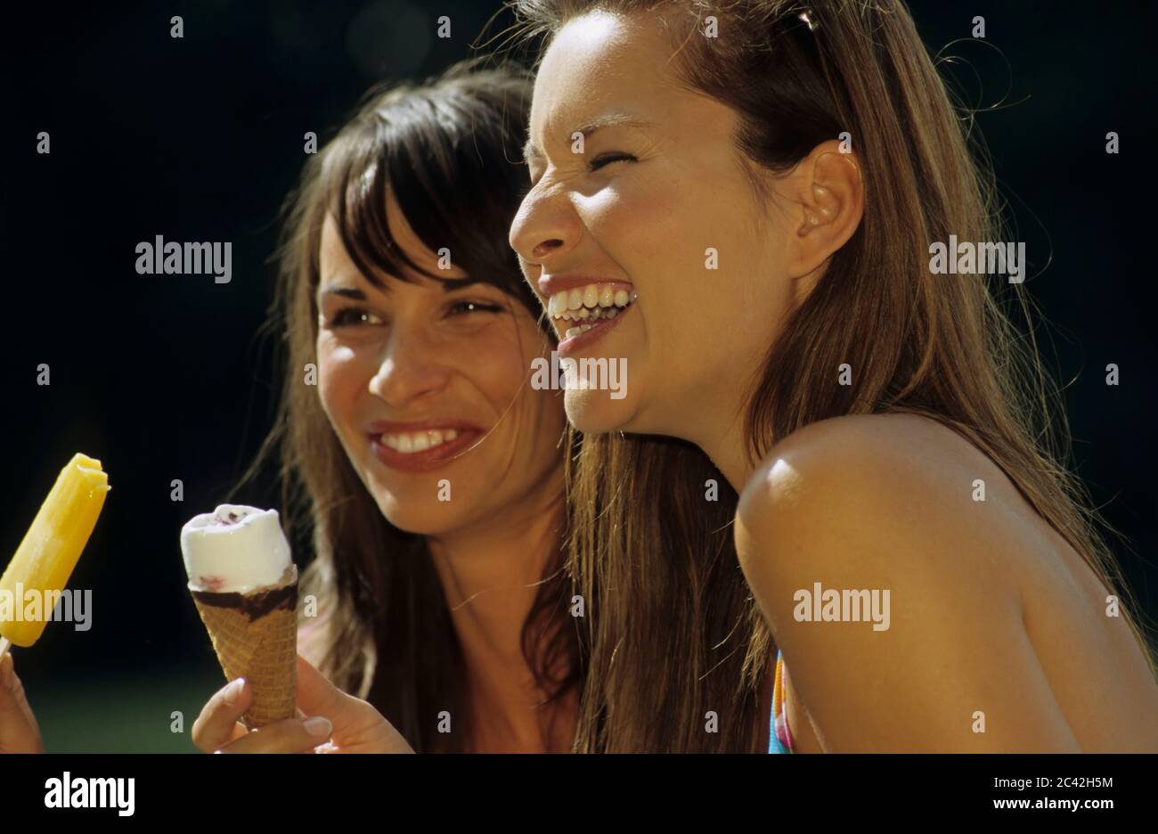 Two friends eat ice cream - togetherness - difference - paradox ...