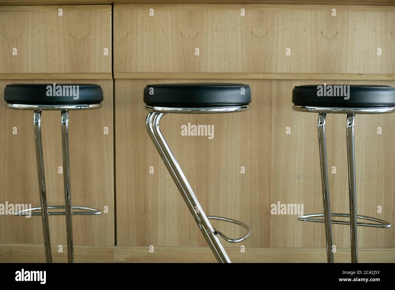 Three bar stools Stock Photo - Alamy