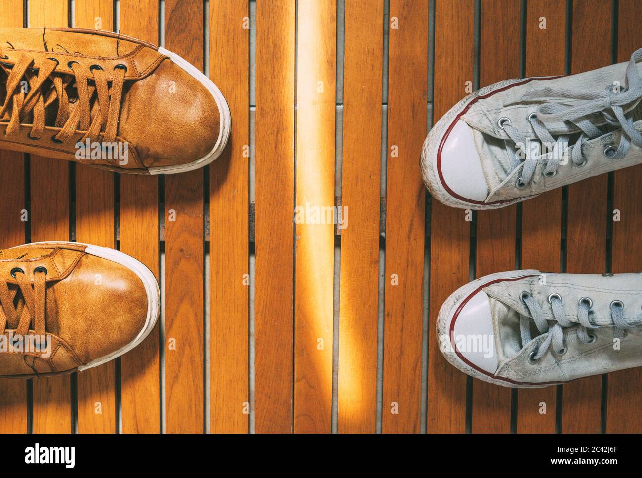 Two feet separated by a line. Social distance concept Stock Photo - Alamy