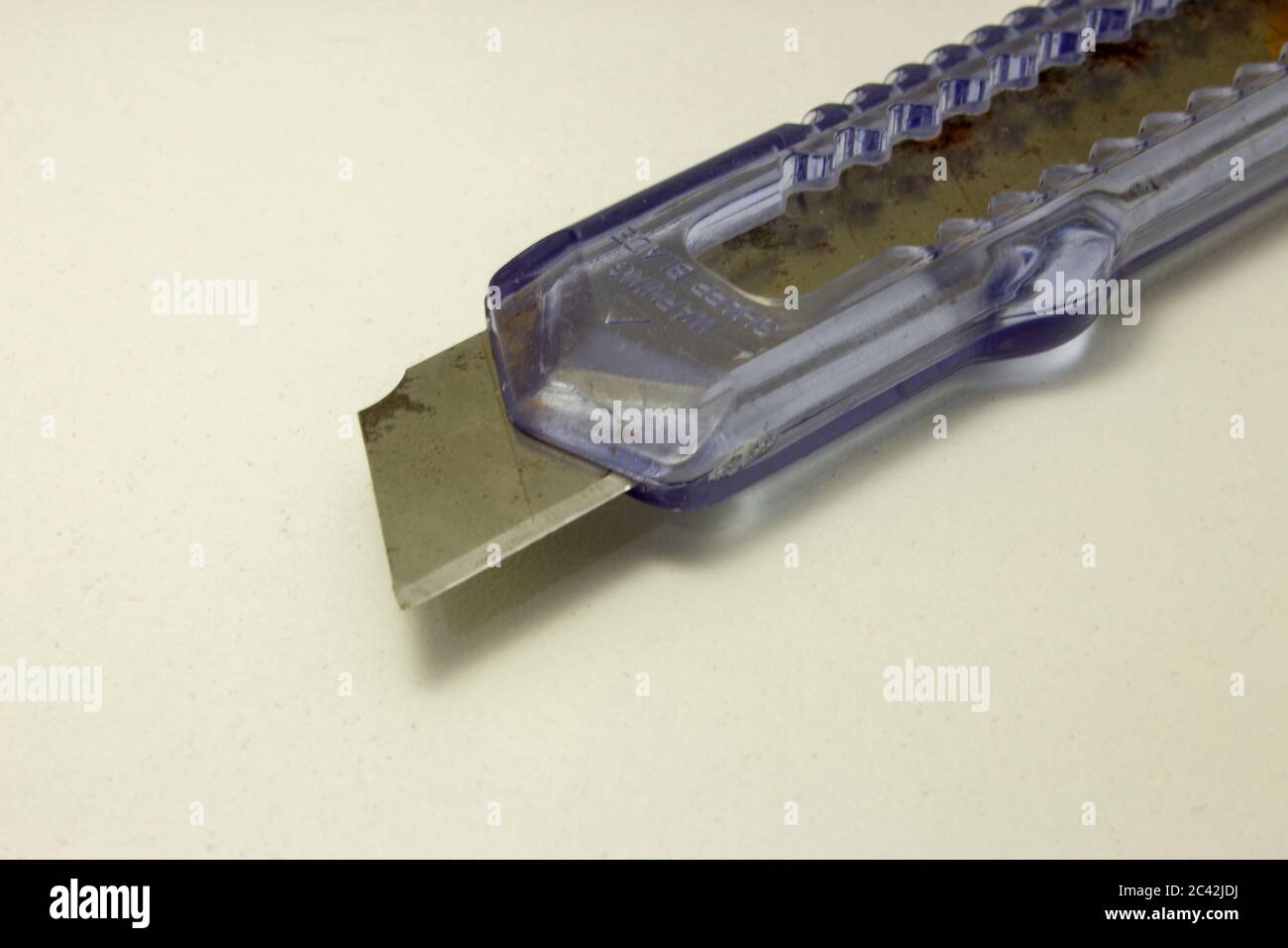 Plastic utility knife with old and rusted blade Stock Photo - Alamy