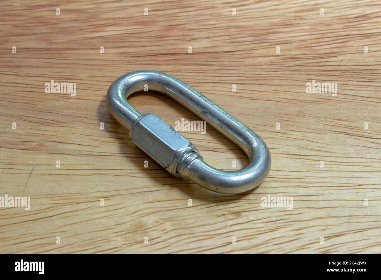 Closed screw metal maillon, for rope working Stock Photo - Alamy