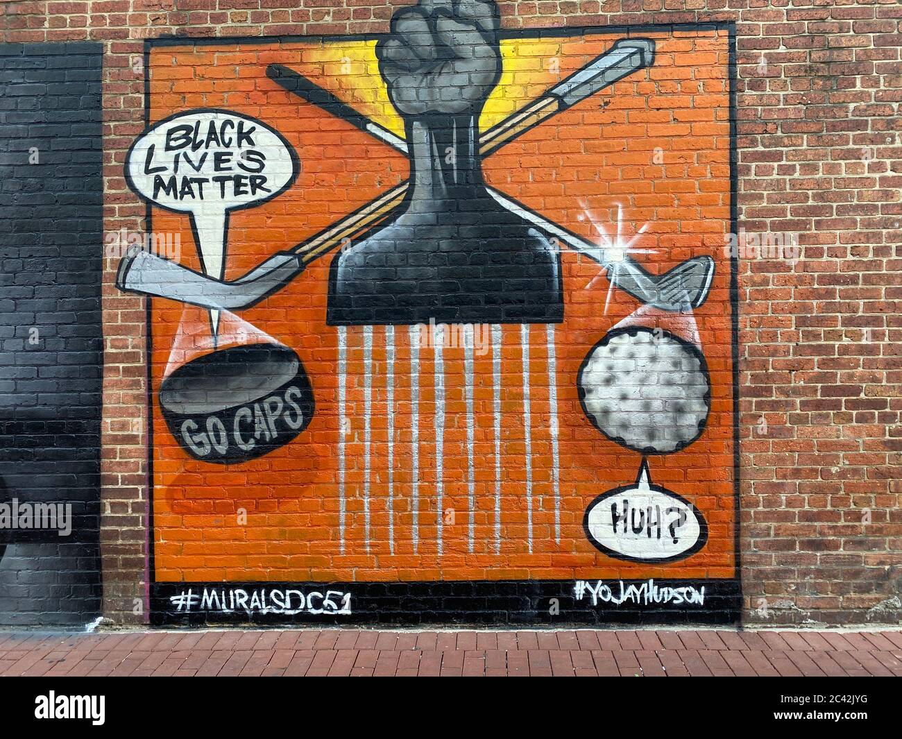 Painting social justice street art hi-res stock photography and images ...