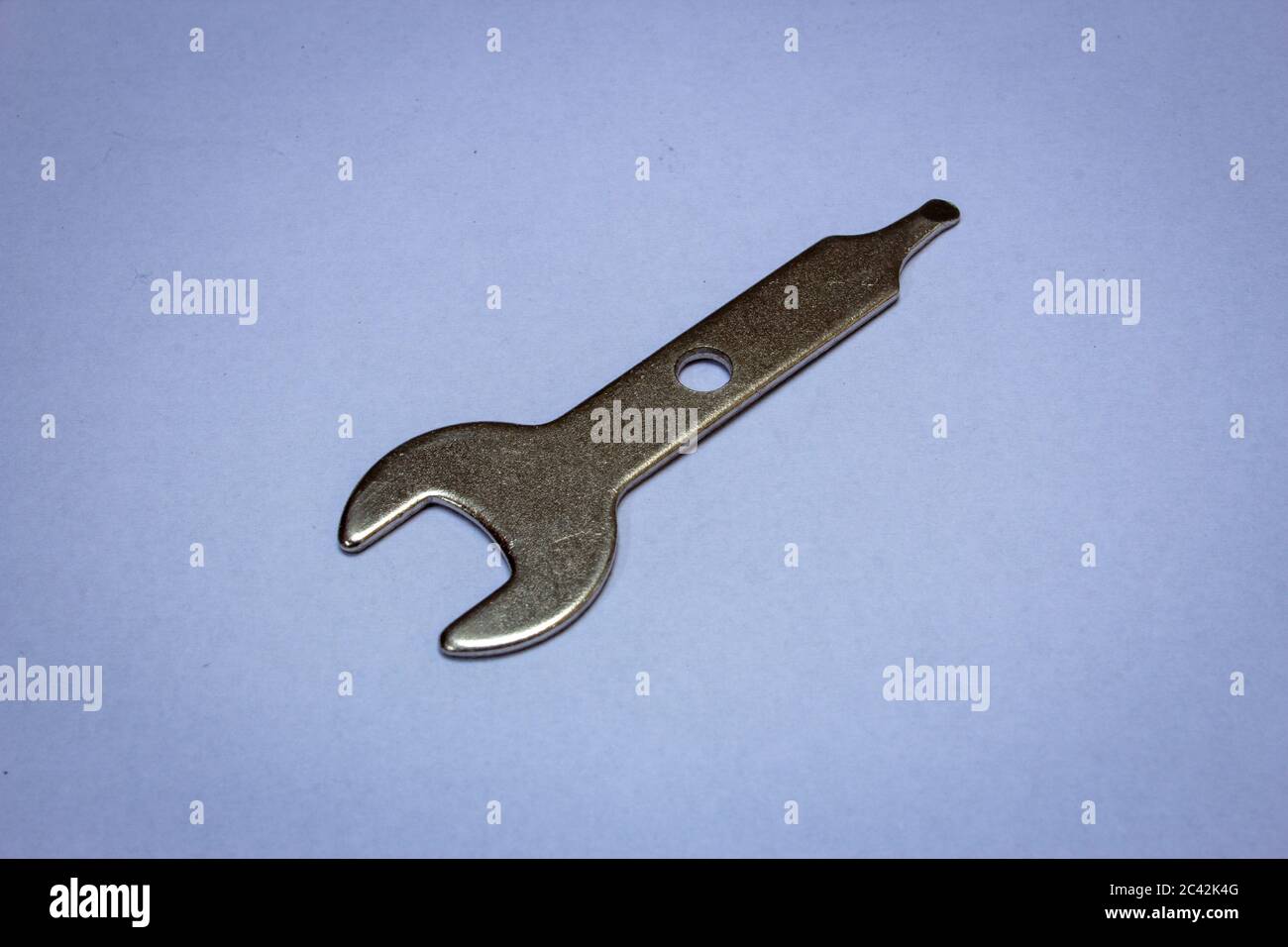 Small spanner used for change bits of a rotatory tool Stock Photo - Alamy