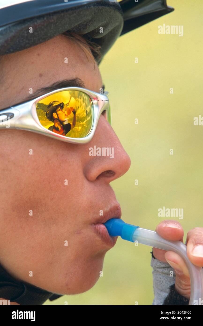 Drinking mountain biker (portrait, profile) - mountain biking Stock ...